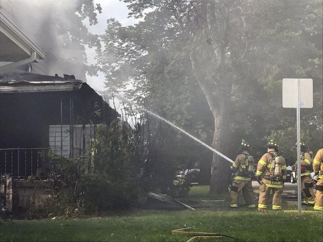 Mother, son escape house fire through second-story window | Local News ...