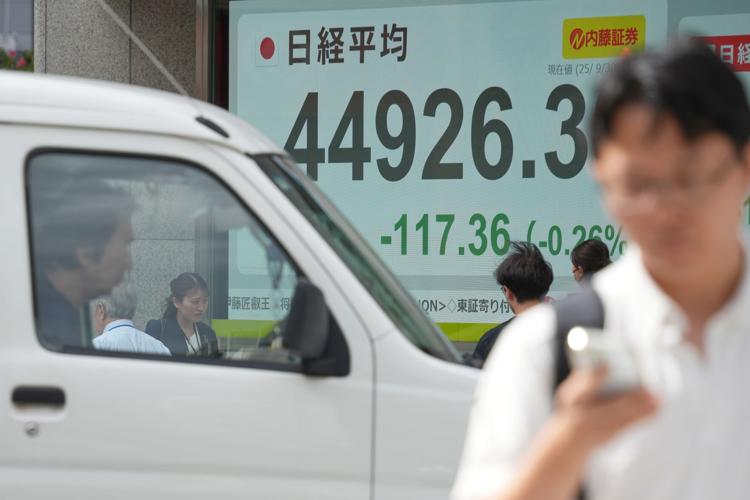 asian-shares-are-mixed-as-traders-brace-for-a-possible-us-government