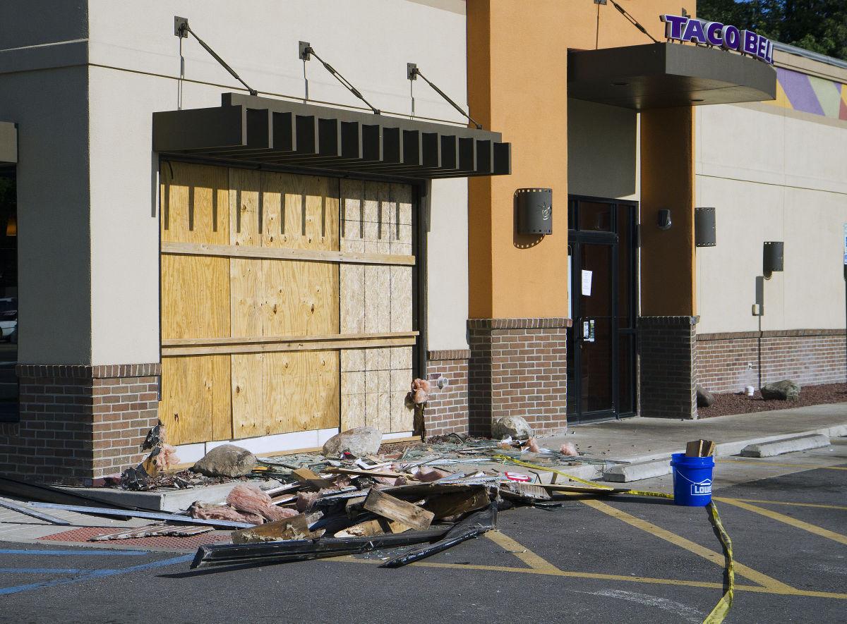 Two injured when car strikes pedestrian, Taco Bell wall | Local News ...