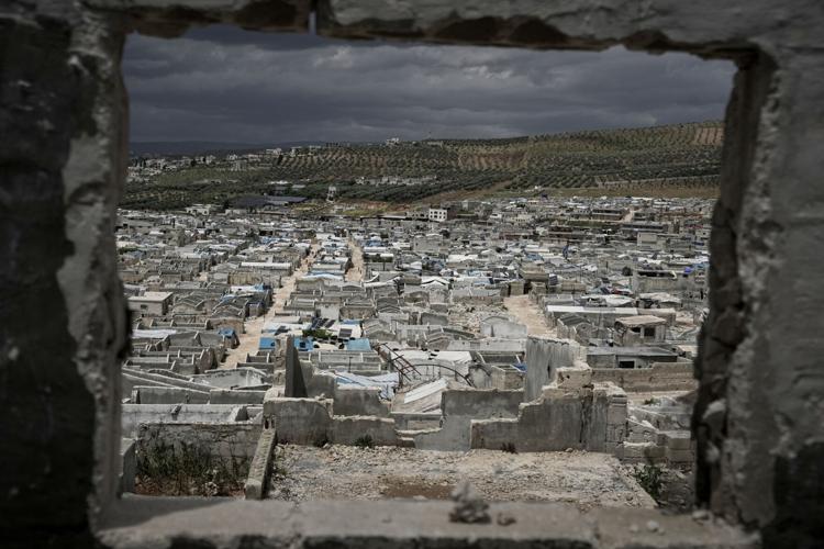 Cash-strapped Syrians living in tent settlements struggle to return ...