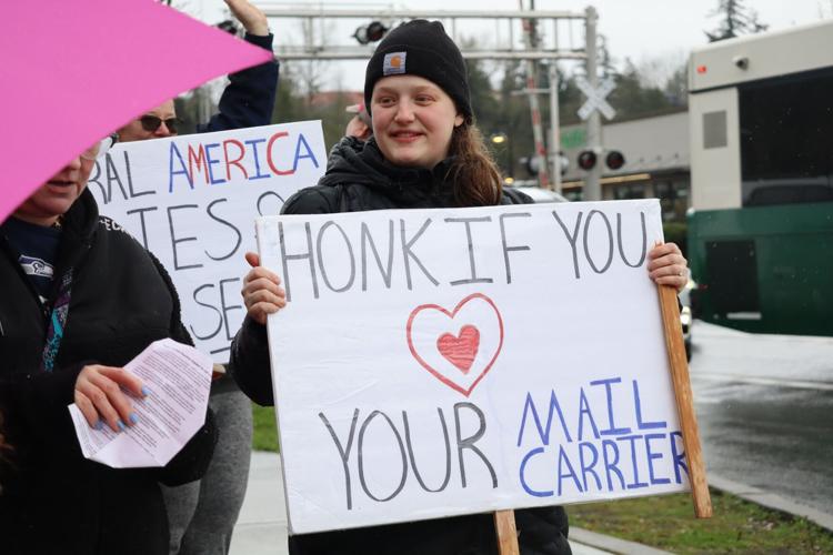 Local protestors turn out to support U.S. Postal Service workers ...