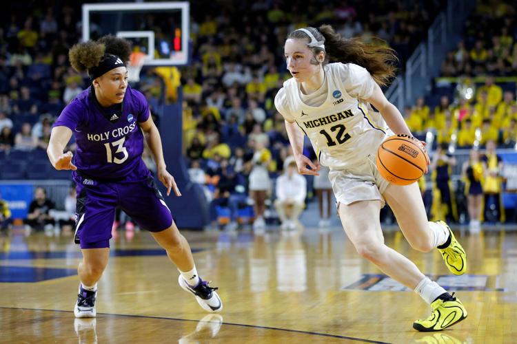 March Madness mismatch: No. 2 Michigan routs Holy Cross 83-48 in women ...