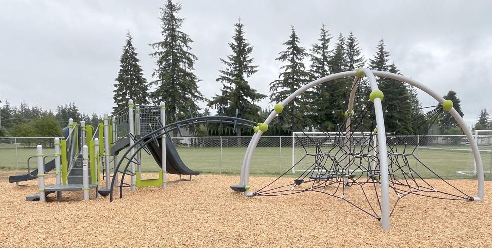 New playground equipment installed at Evergreen Elementary School ...