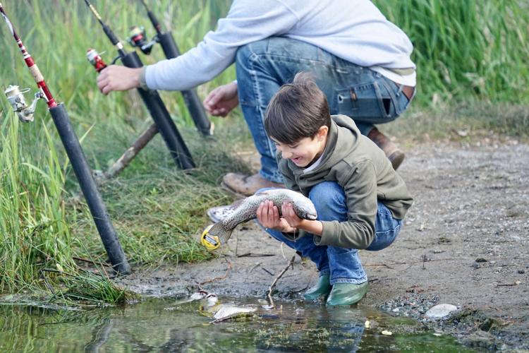Big trout, bigger turnout: Annual Heart Lake event gets kids hooked on ...
