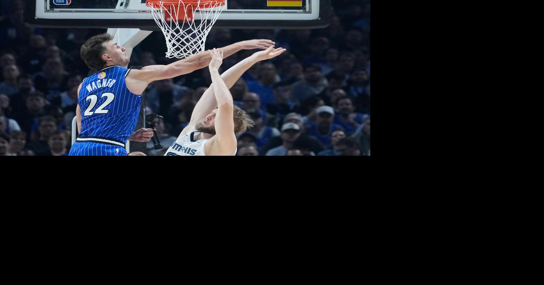 Magic beat Grizzlies 118-111 in NBA's first regular-season game in ...