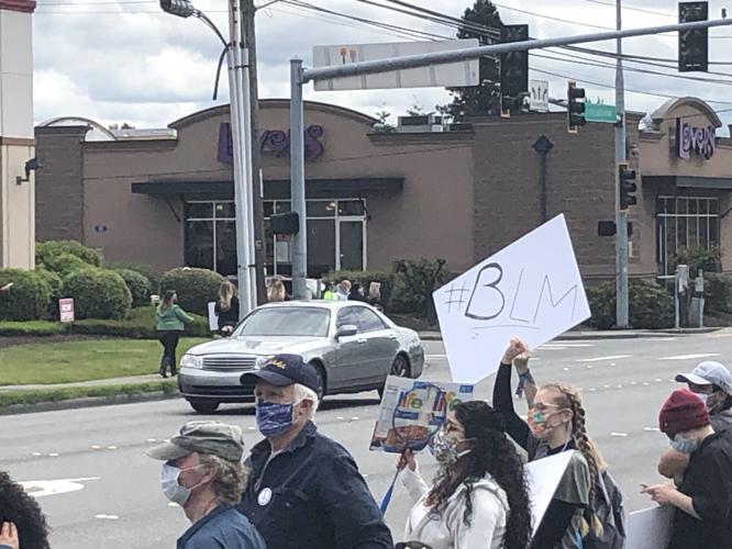 Protesters line Burlington Boulevard in Black Lives Matter protest ...