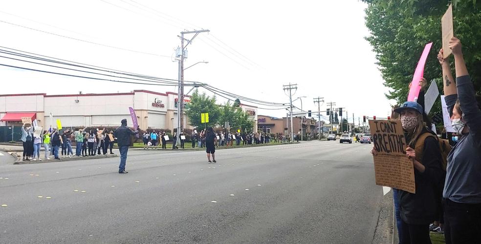 Protesters line Burlington Boulevard in Black Lives Matter protest ...