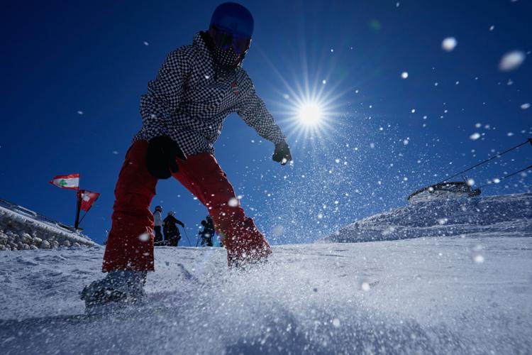 Photos show people in Lebanon enjoying winter weather on the slopes ...