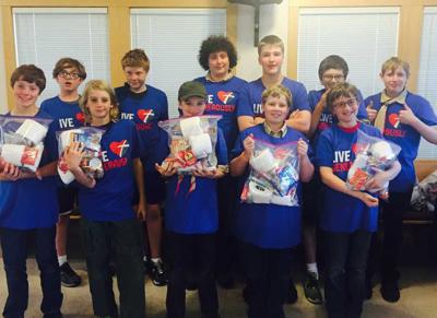 Boy Scout troop makes ‘Joseph Bags’ for community service project ...