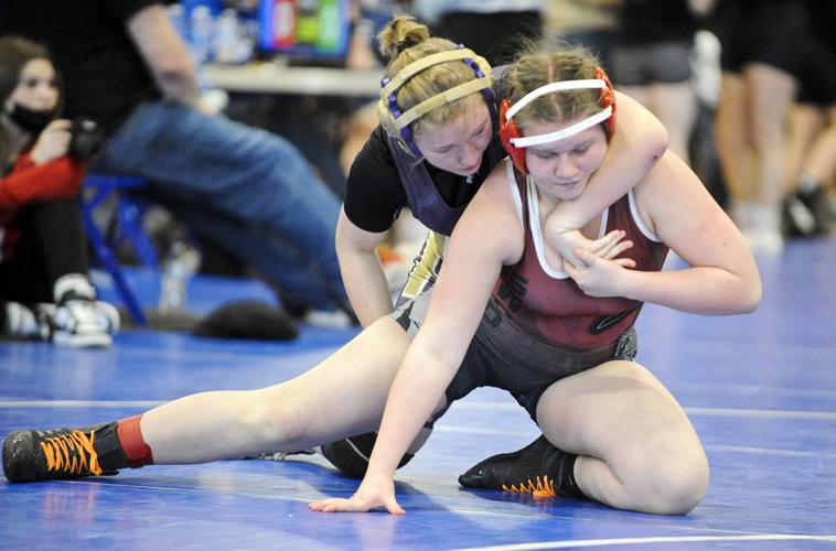Prep Roundup: 12 Spartan wrestlers advance to state; both hoops teams 1 ...