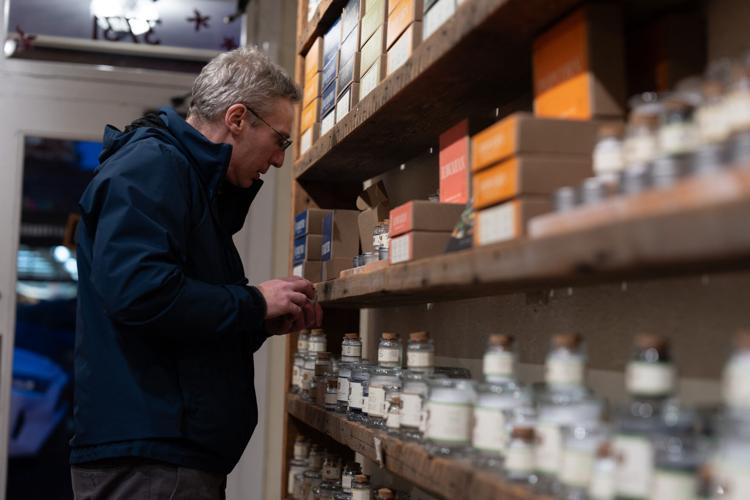 Prices ticked up in November as Americans keep spending, a key ...