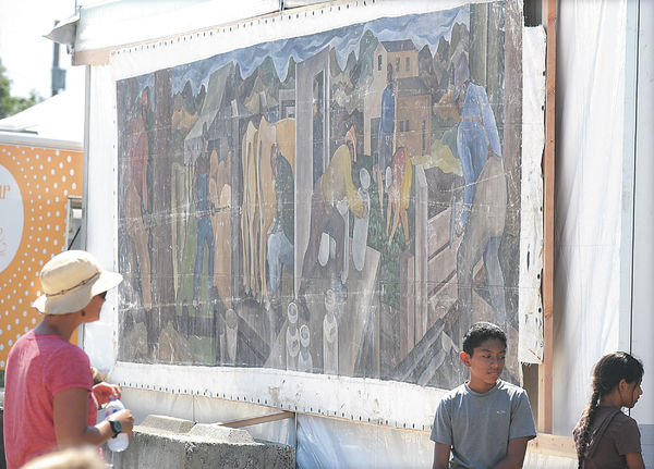 Family’s long-folded tarp reveals enormous old mural | All Access ...