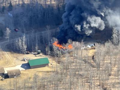 A recent house fire on Trout Lake, as viewed by Rusty Eichorn who ...