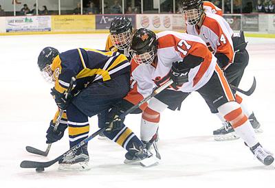 Hockey roundup: Hawks take down Rapids; Raiders shut out Storm | Sports ...