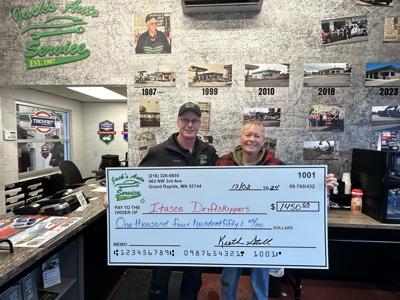 Jacks auto service donates to The Itasca Driftskippers Snowmobile club ...