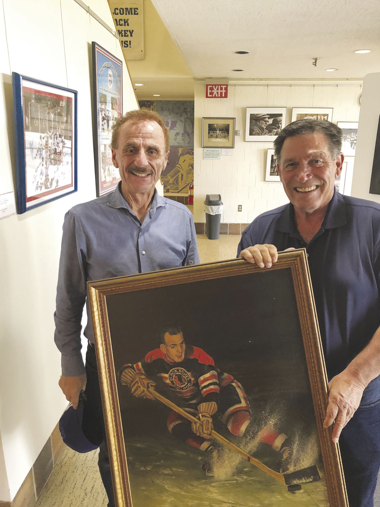 Mariucci artwork now in Hall of Fame | College | grandrapidsmn.com