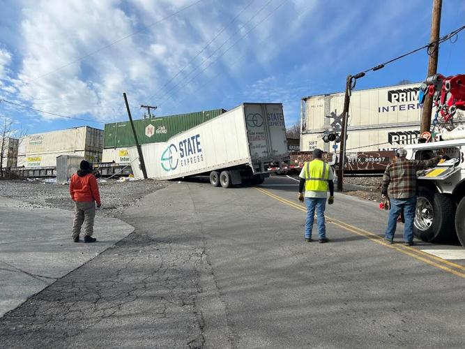Freight Train Slams Into Tractor-Trailer Stuck On Railroad Tracks; No ...