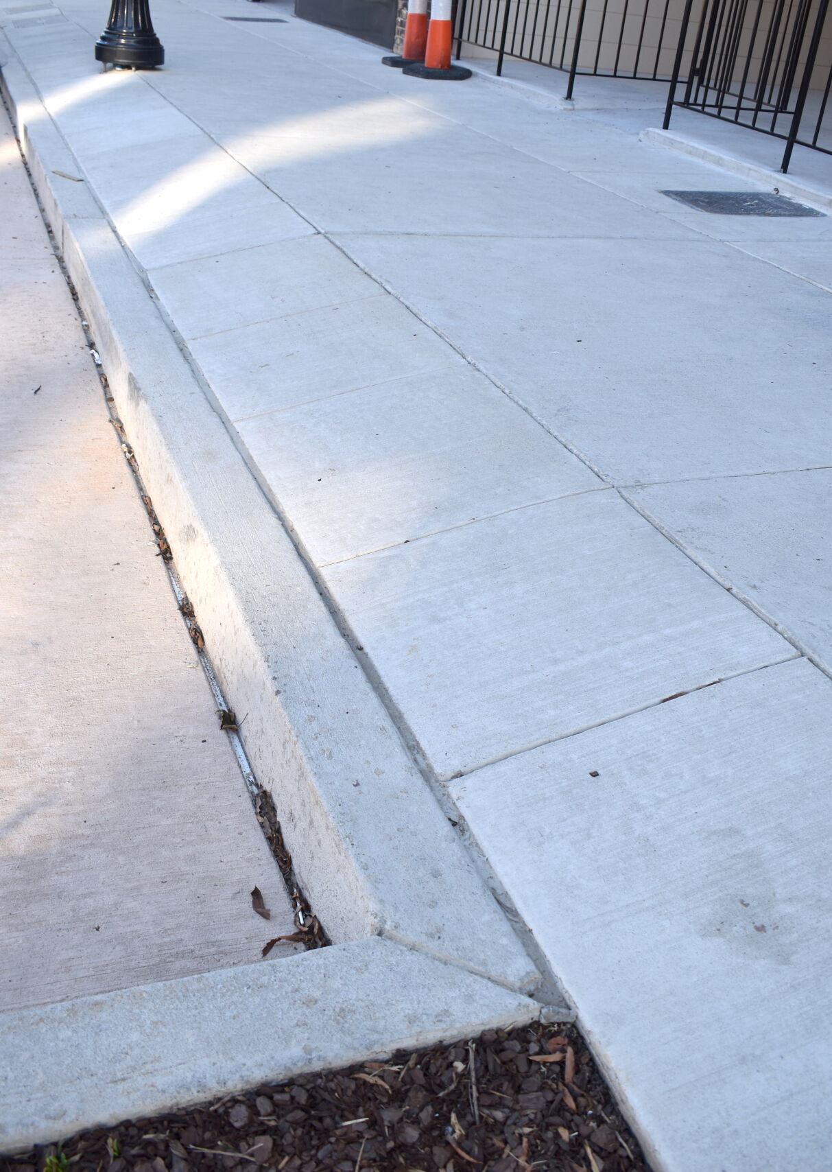 Sloping Sidewalk Sections On Depot Street To Be Stained | Local News ...