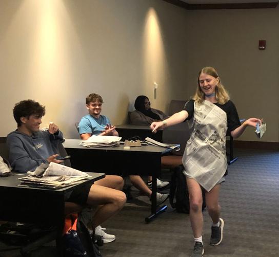 Students Develop Fashions Out Of Newspapers In TU Experience Class ...
