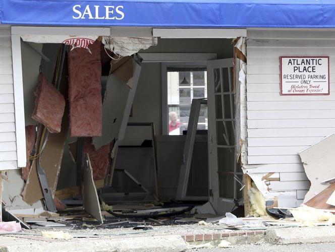Car crashes into office building; drives all the way through ...