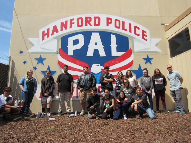 Community Artists paint Hanford PAL signs | Local News ...