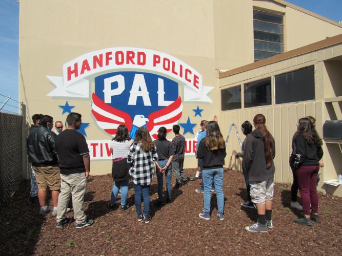 Community Artists paint Hanford PAL signs | Local News ...