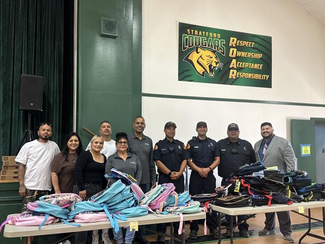 Local organization distributes backpacks and laptops to students ...