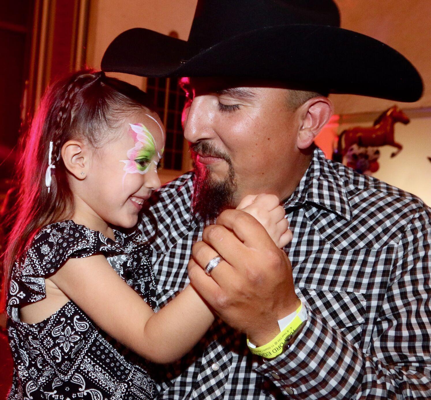 Moms, dads, kids dance the night away in Hanford | Local News ...