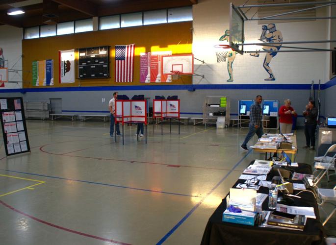 Voters, volunteers head to the Longfield Center on Election Day ...