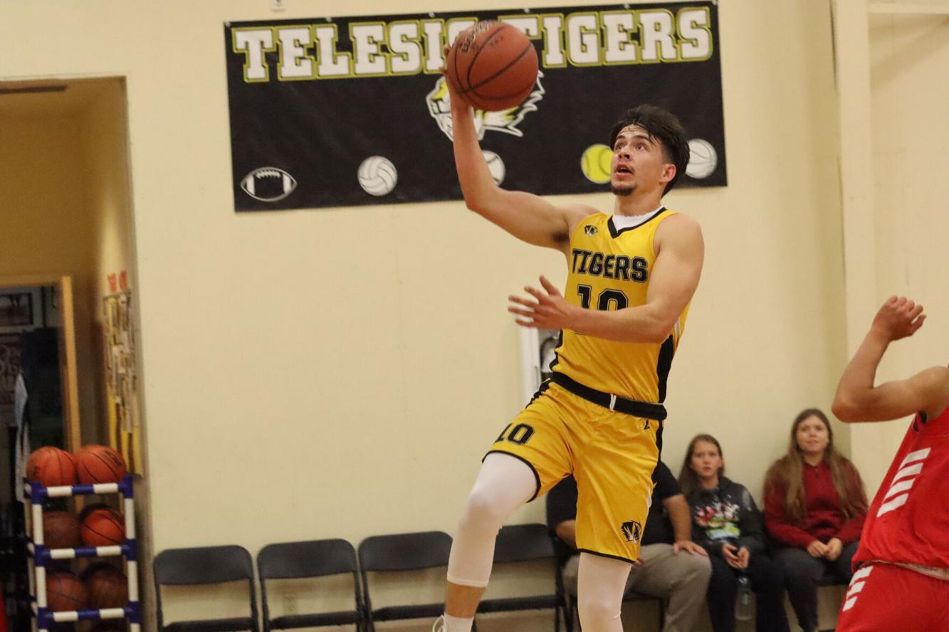 Telesis boys basketball gets season opening win on time-expiring free ...