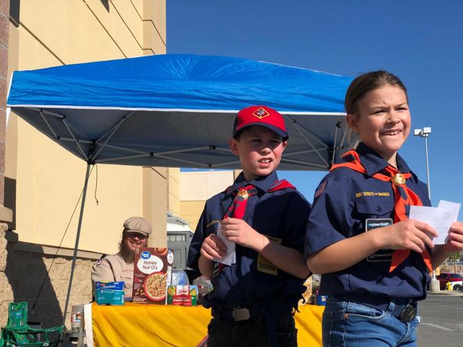 Photos: Cub Scouts support food bank with food drive | Local News ...