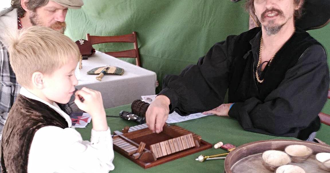 Traveling game vendor brings 100-year-old games to London Bridge ...