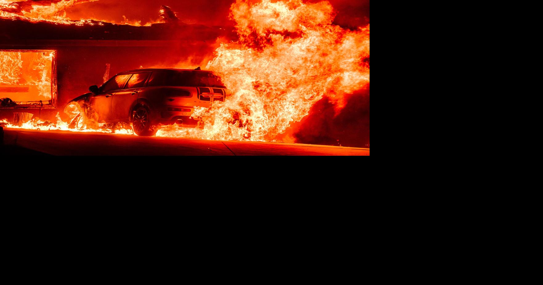 At least 5 dead in L.A. firestorms; more than 1,000 structures lost ...