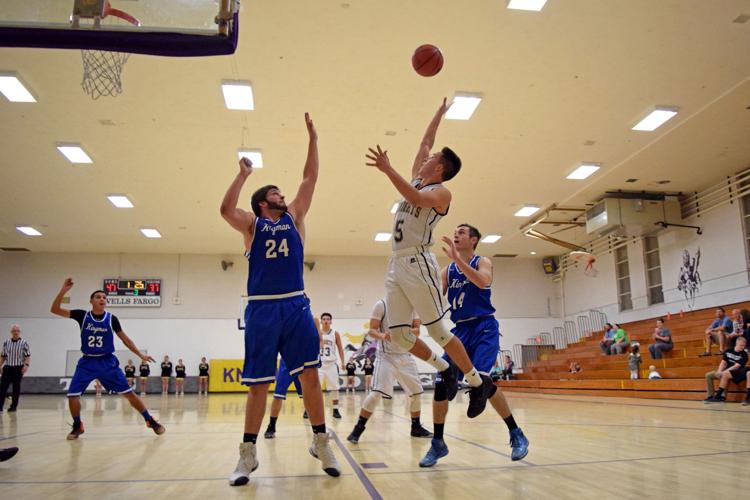 PHOTOS: LHHS boys basketball vs Kingman | Local Sports News ...
