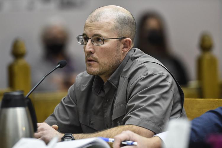 Judge reluctantly accepts plea deal in mask dispute