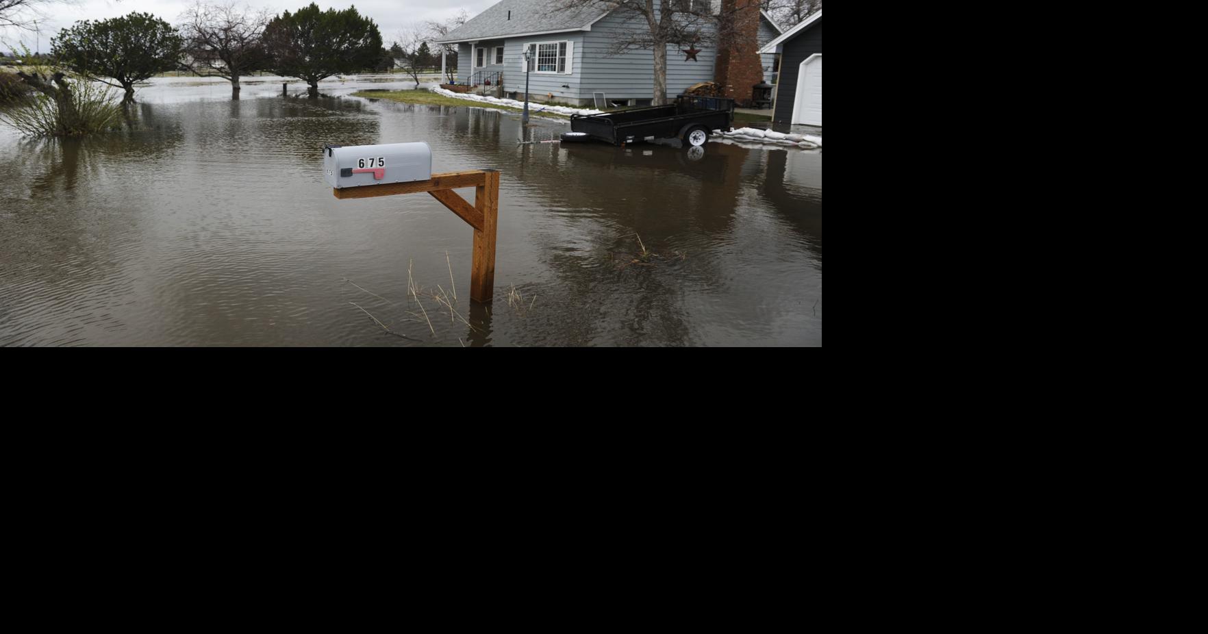 Helena Valley flooding prompts road closures as residents work to ...