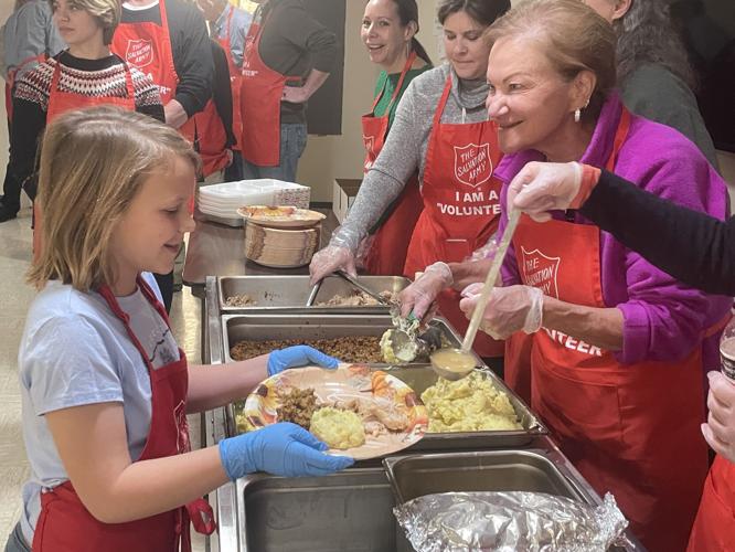 Volunteers help serve Salvation Army Thanksgiving dinner