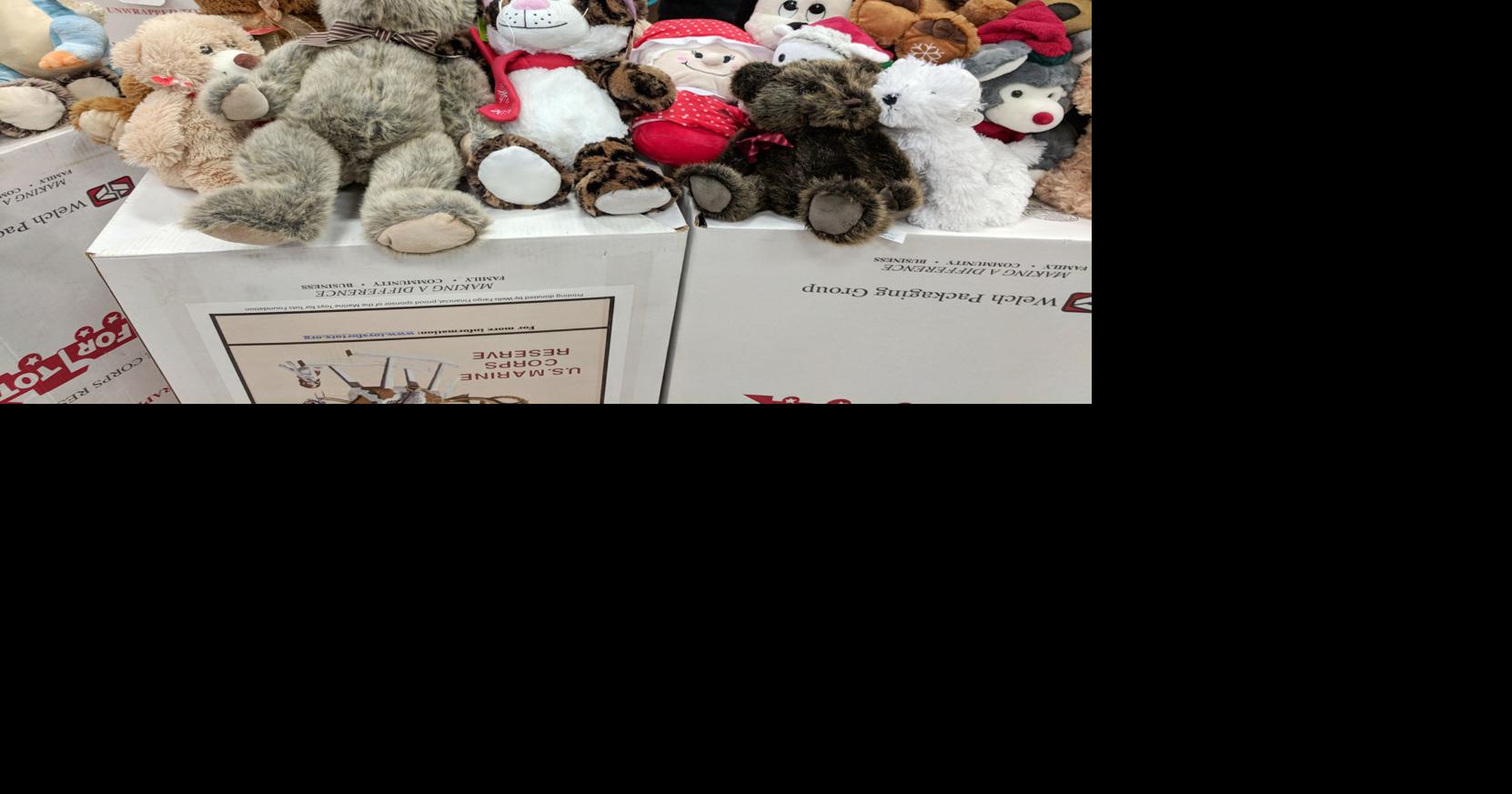 Toys for Tots giveaway bustles with joy