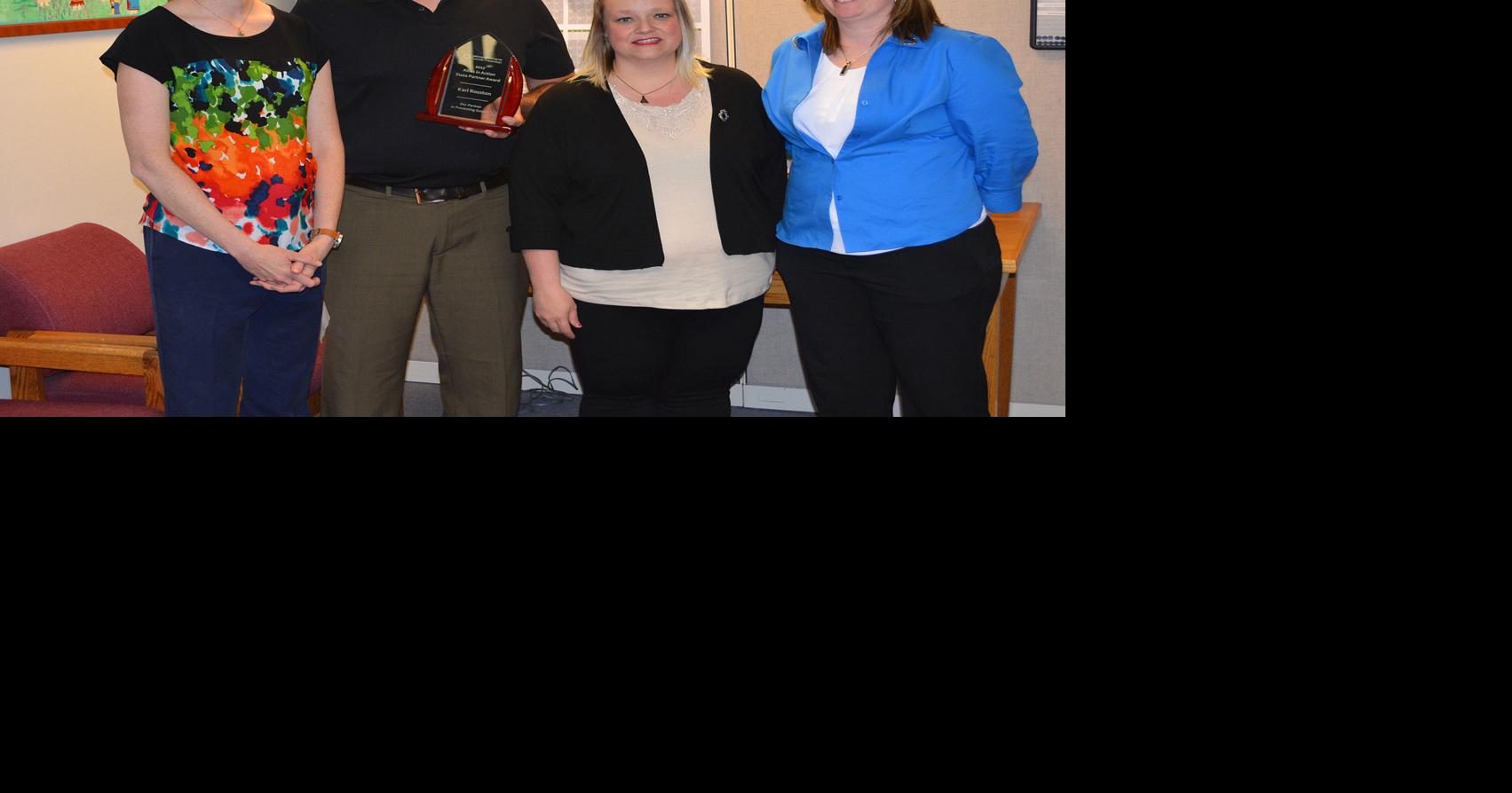 Karl Rosston with DPHHS wins national suicide prevention award