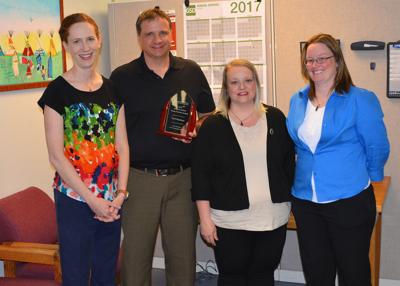 Karl Rosston with DPHHS wins national suicide prevention award