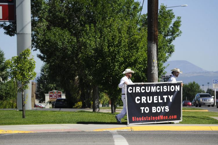 Anti-circumcision group stages protest at busy Helena intersection