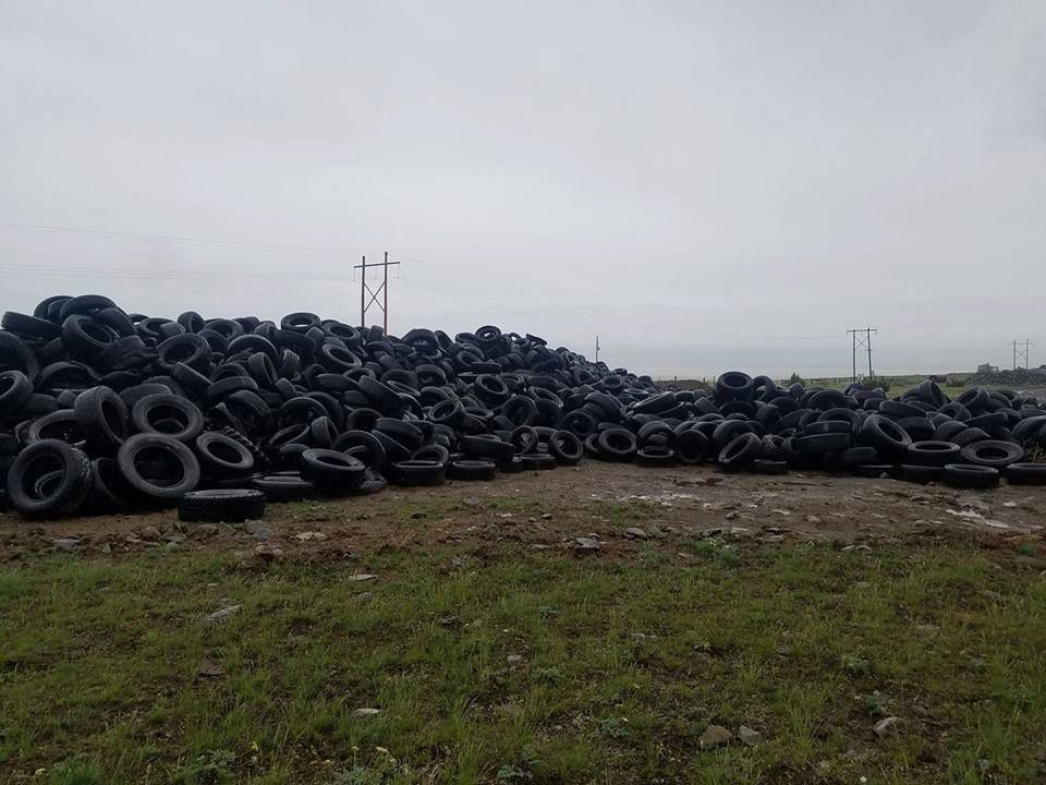 State orders company to stop dumping tires near Winston
