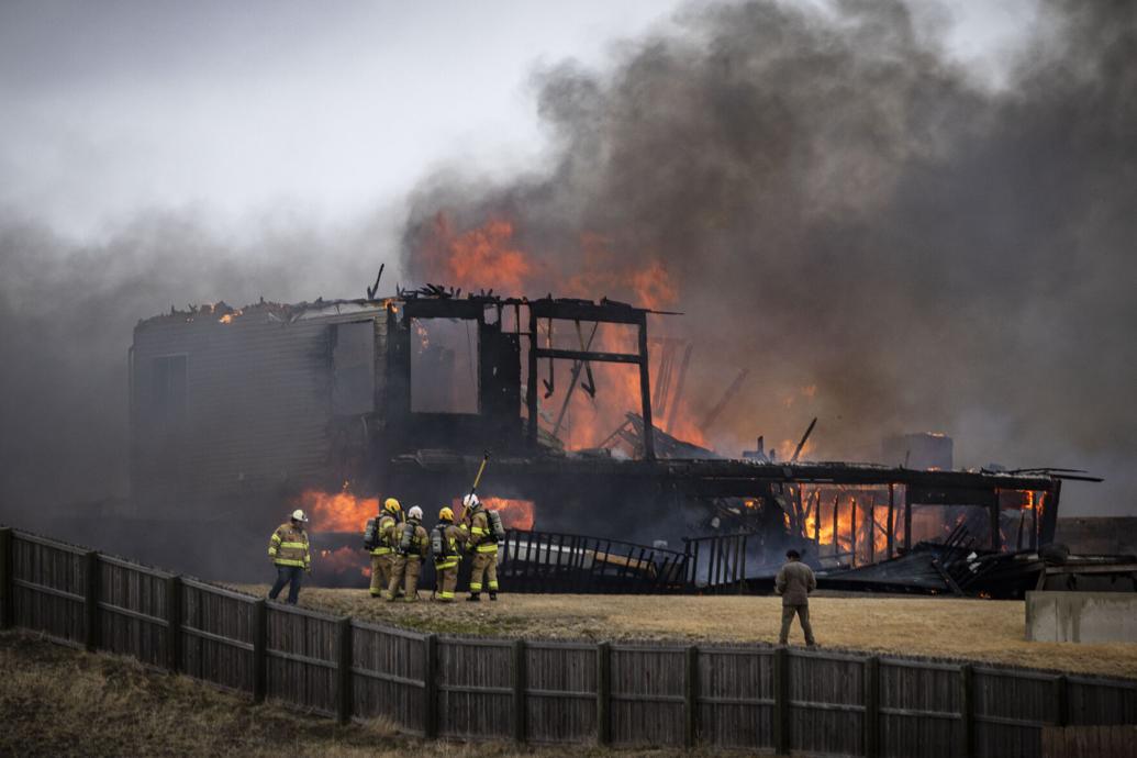 Firefighters respond to house fire in Helena's East Valley