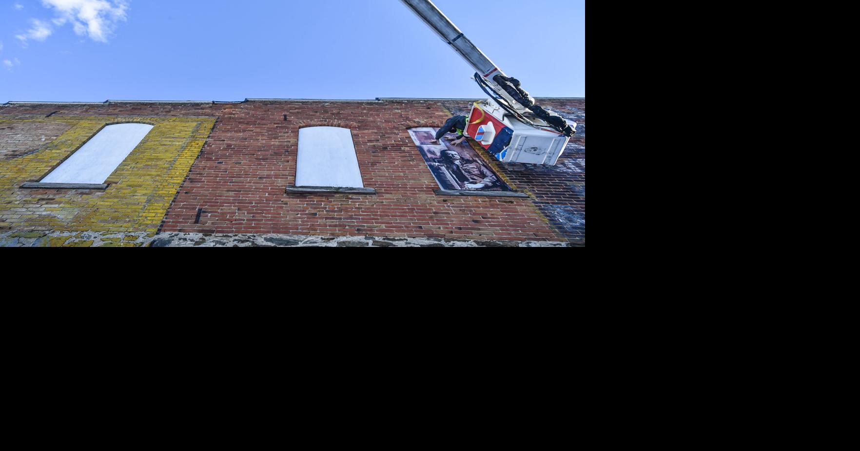 'Faces of the neighborhood': Portrait series hung on historic Livery ...
