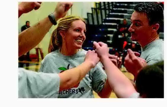 TEACHERS TOP COPS IN CHARITY BASKETBALL