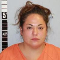 Helena woman accused of third partner or family member assault