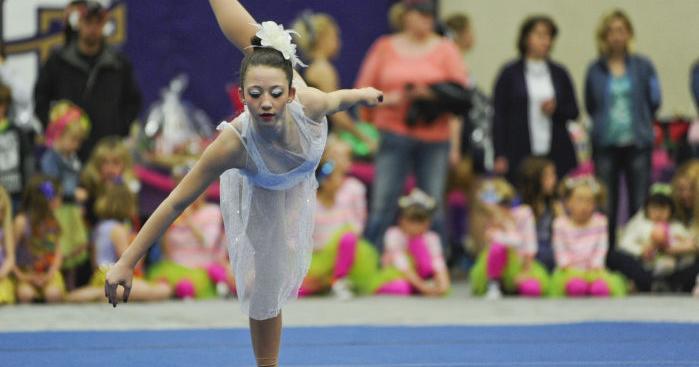 Cheer and dance meet kicks off at Carroll; action continues today