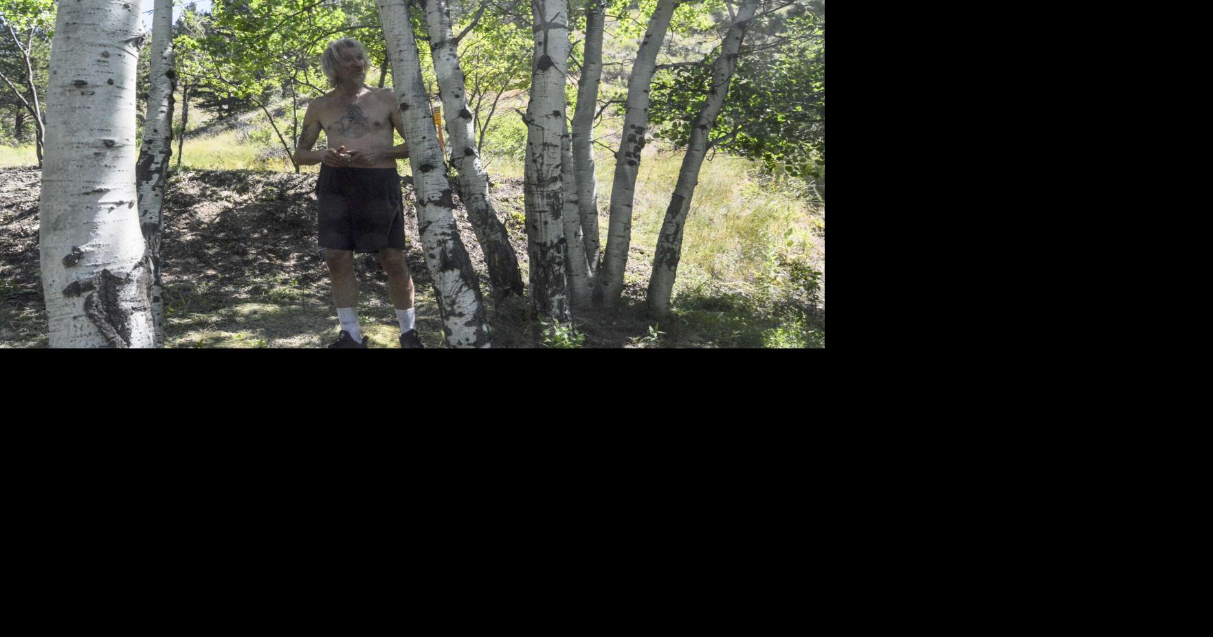 Unsheltered camp relocates onto U.S. forest service land