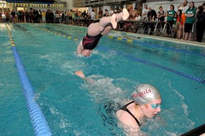 Helena High swim teams sweep titles at home