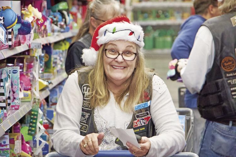 Motorcycle club provides Christmas for kids | Local News | herald ...